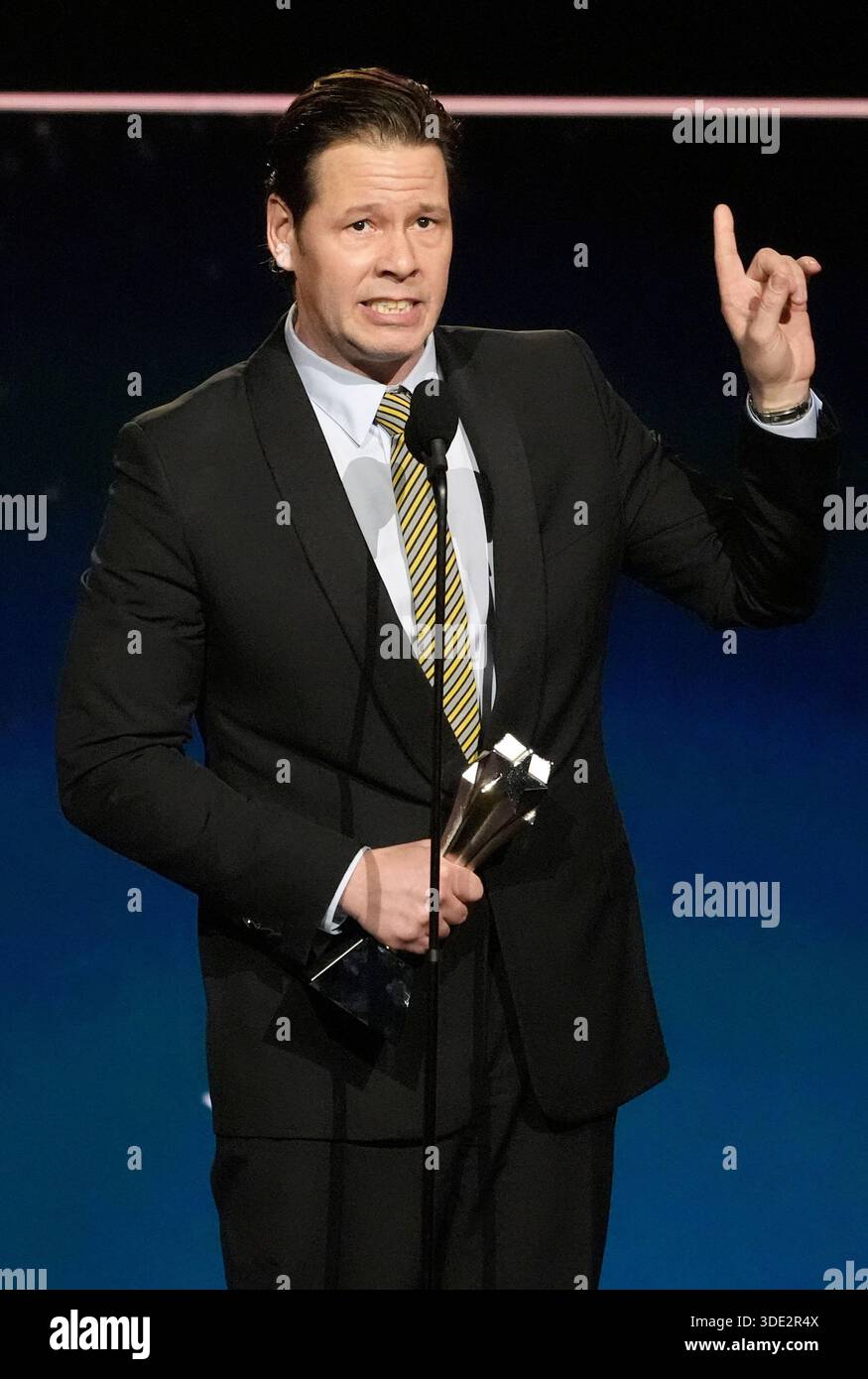 Ike Barinholtz accepts the award for best supporting actor in a comedy ...