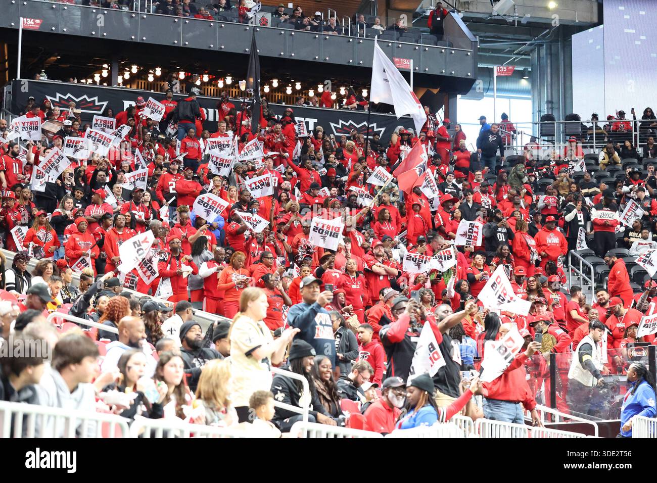 The Atlanta Falcons fans wave their “Rise Up” flags during a NFL game ...
