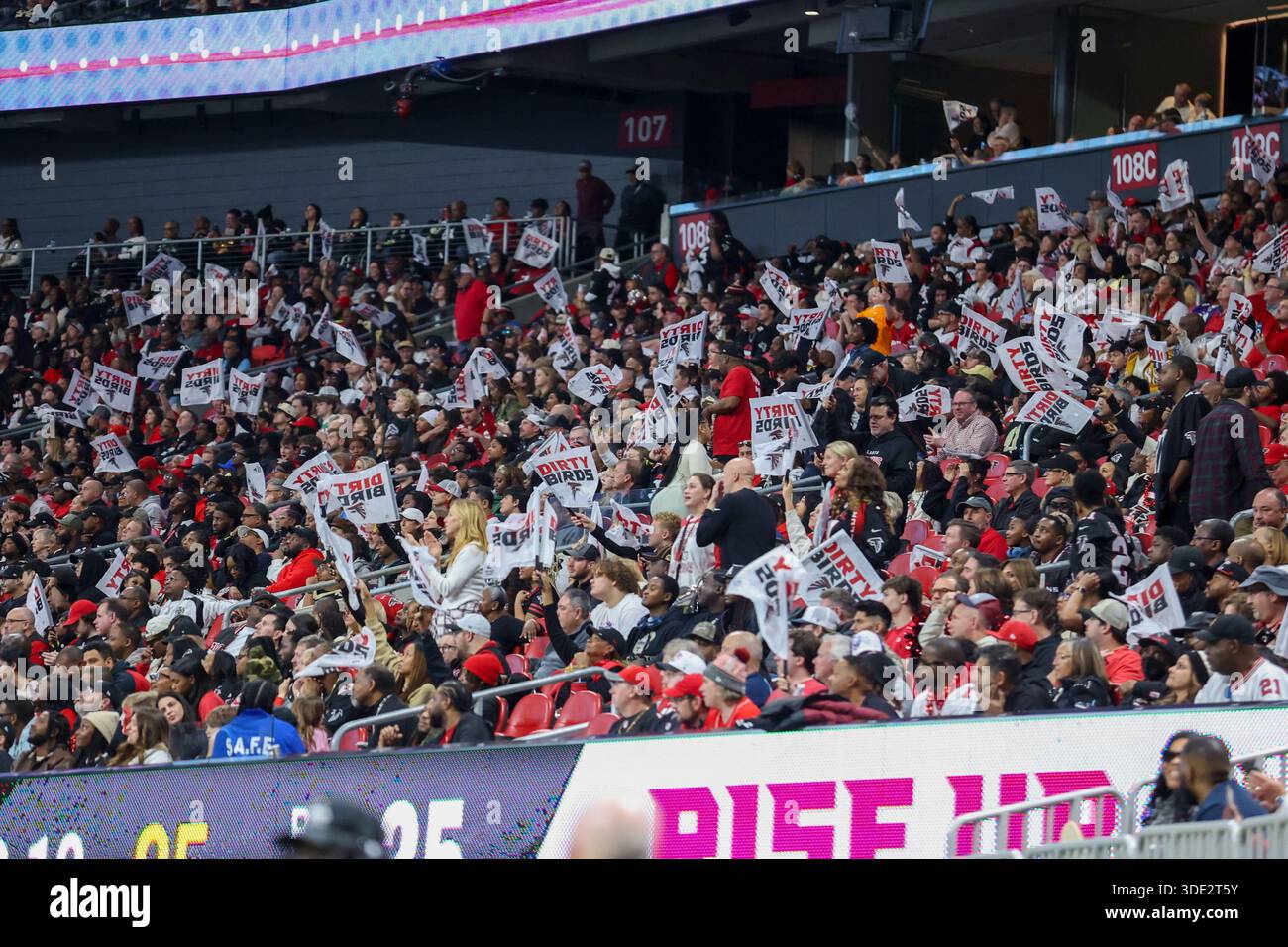 Atlanta Falcons wave their “Dirty Birds” flags during the second half ...
