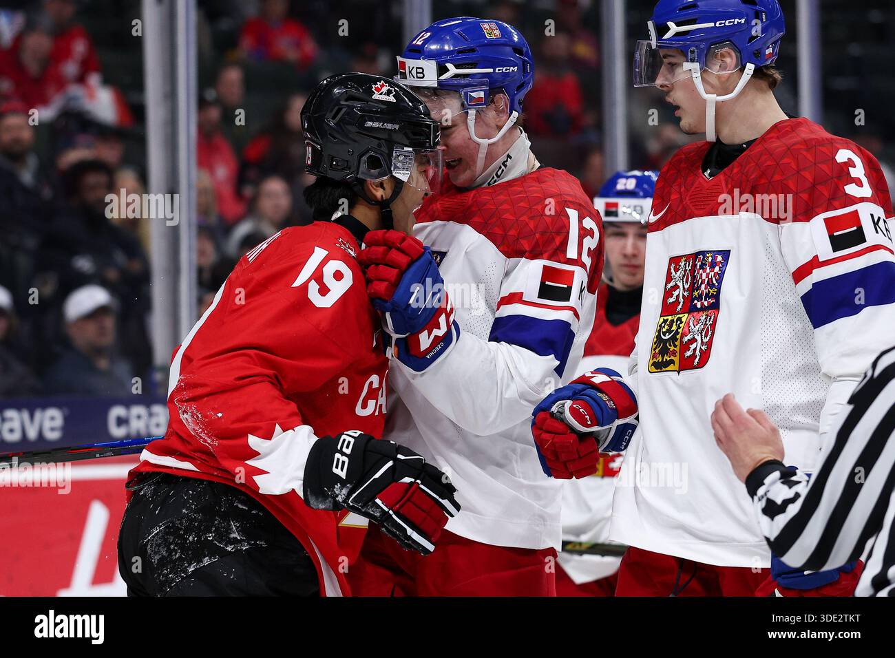 Canada defense Zayne Parekh, left, and Czechia forward Maxmilian Curran ...