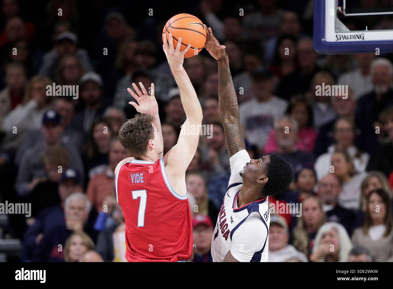 Gonzaga guard Tyon Grant-Foster, right, blocks a shot by Loyola ...