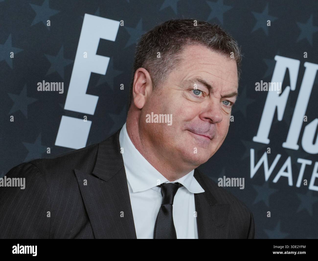 Nick Offerman walking on the red carpet at the 31st Annual Critics ...