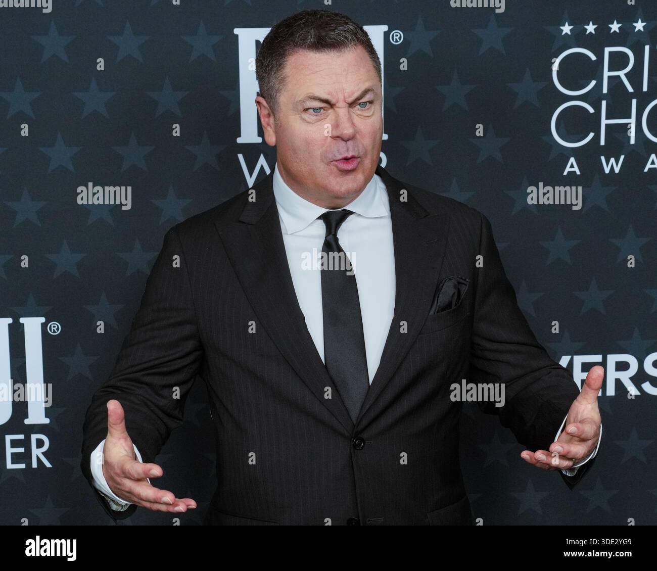 Nick Offerman walking on the red carpet at the 31st Annual Critics ...