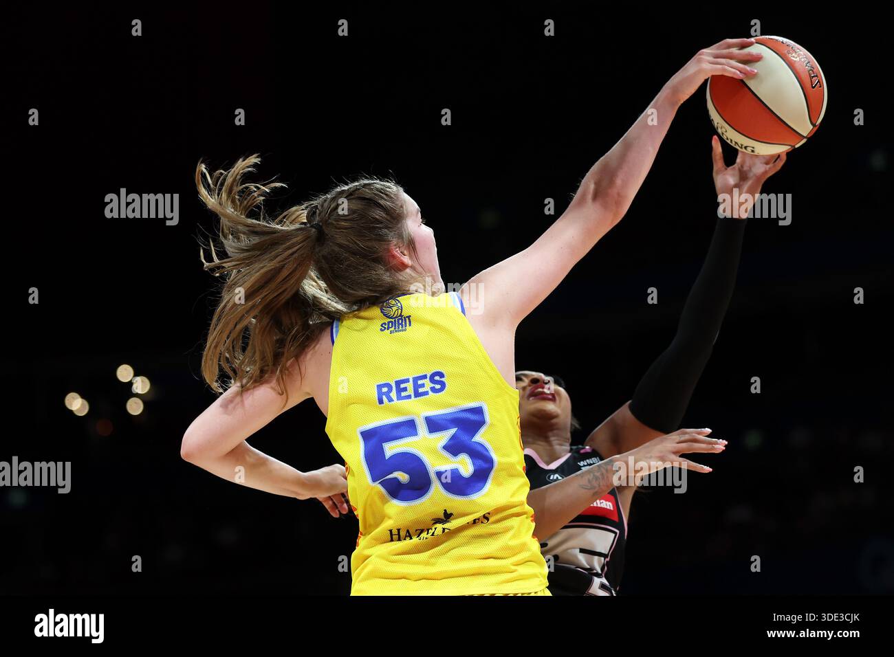 Kelsey Rees of the Spirit blocks the shot from Unique Thompson of the ...