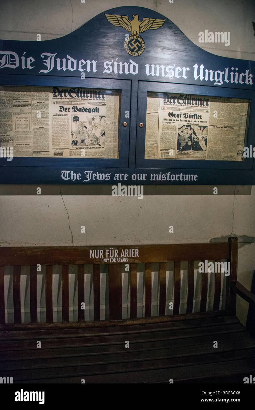 A museum scene recreating an Nazi-era public bench and antisemitic ...