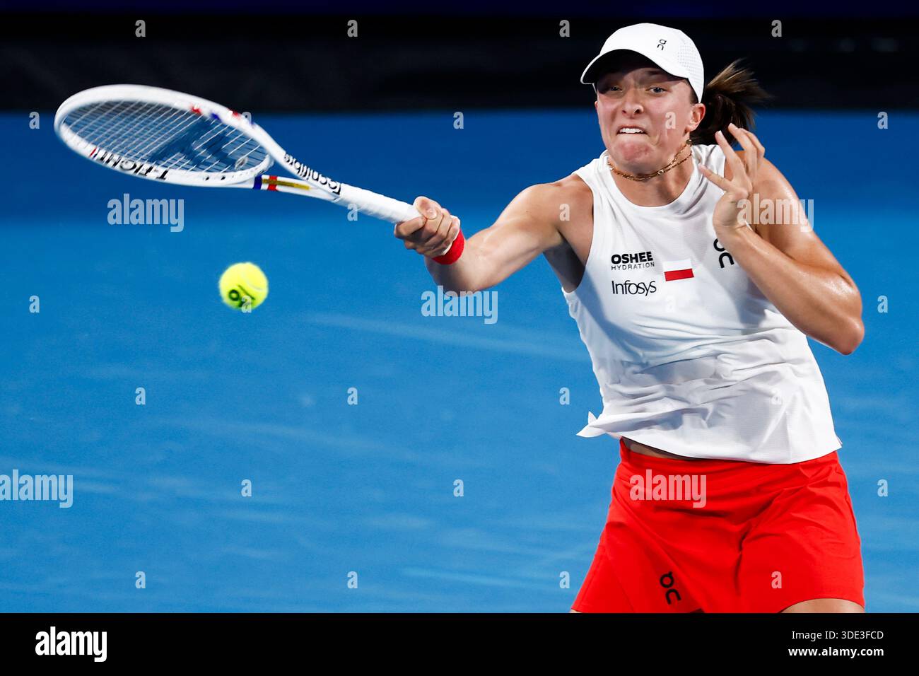 Iga Swiatek of team Poland plays a forehand in her Group F singles ...