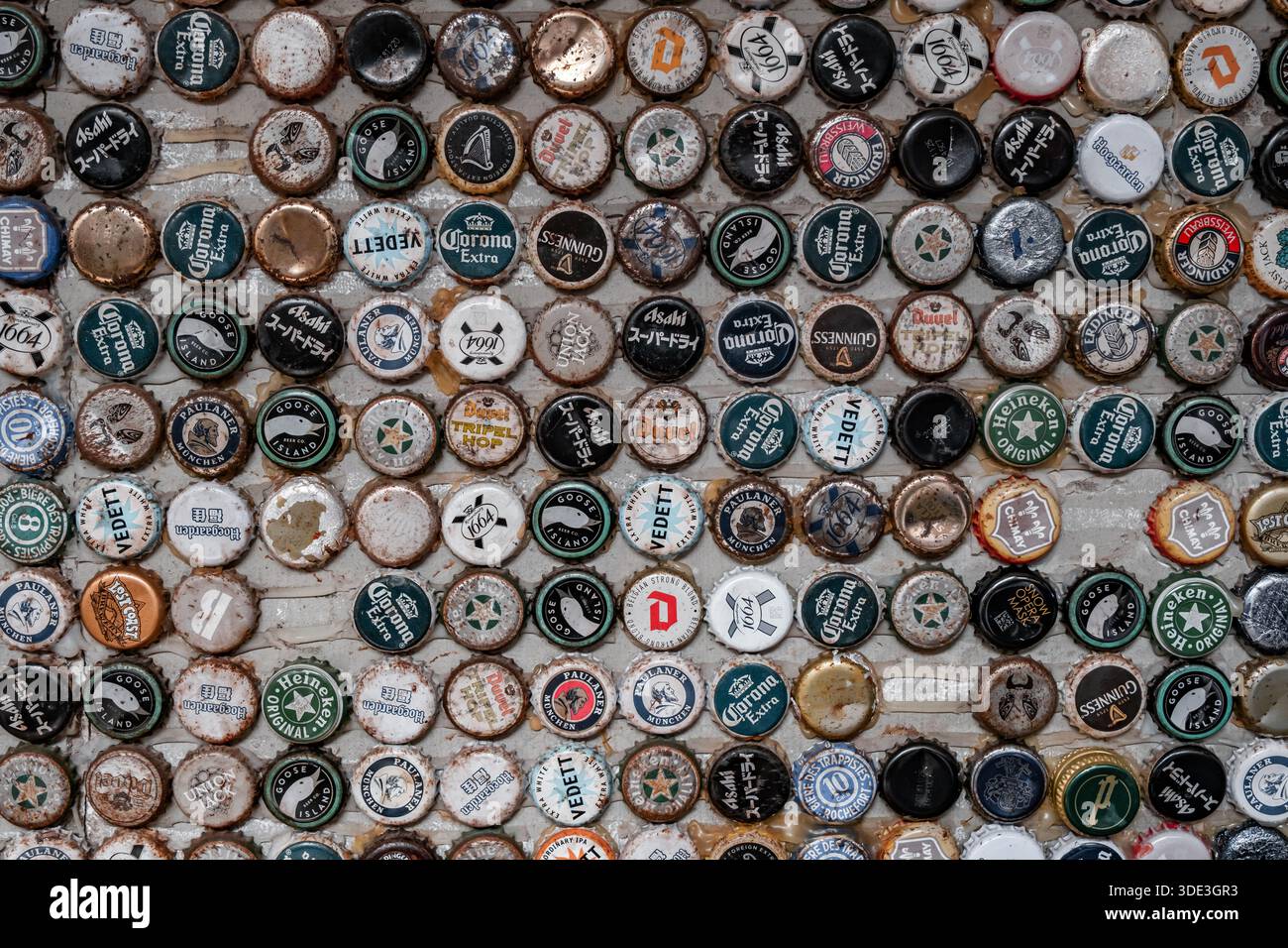 Photograph of a grid of old beer bottle caps hi-res stock photography ...