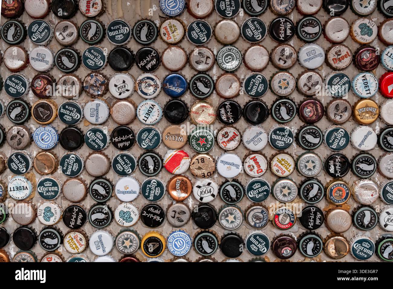 Photograph of a grid of old beer bottle caps hi-res stock photography ...