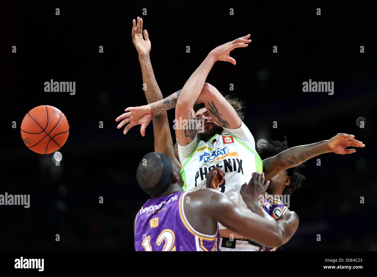 DJ Mitchell of the Phoenix competes for the rebound during the NBL ...