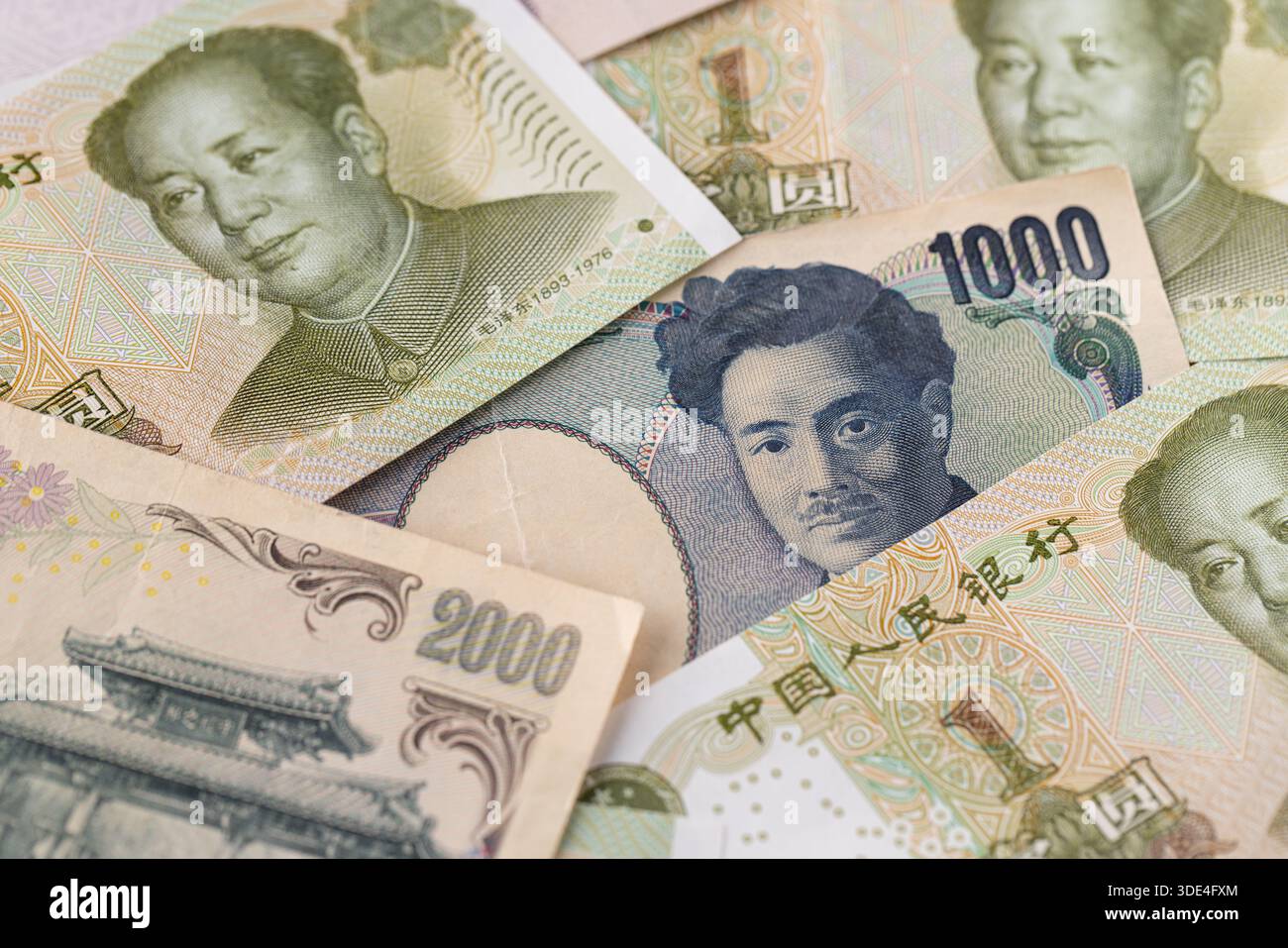 Chinese Yuan and Japanese Yen Banknotes Background Stock Photo - Alamy