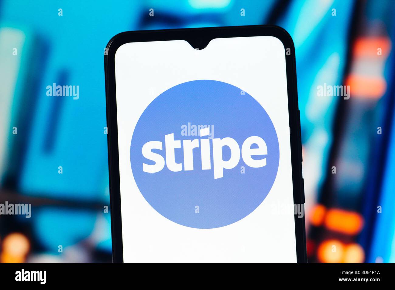 In this photo illustration, the Stripe logo is seen displayed on a ...