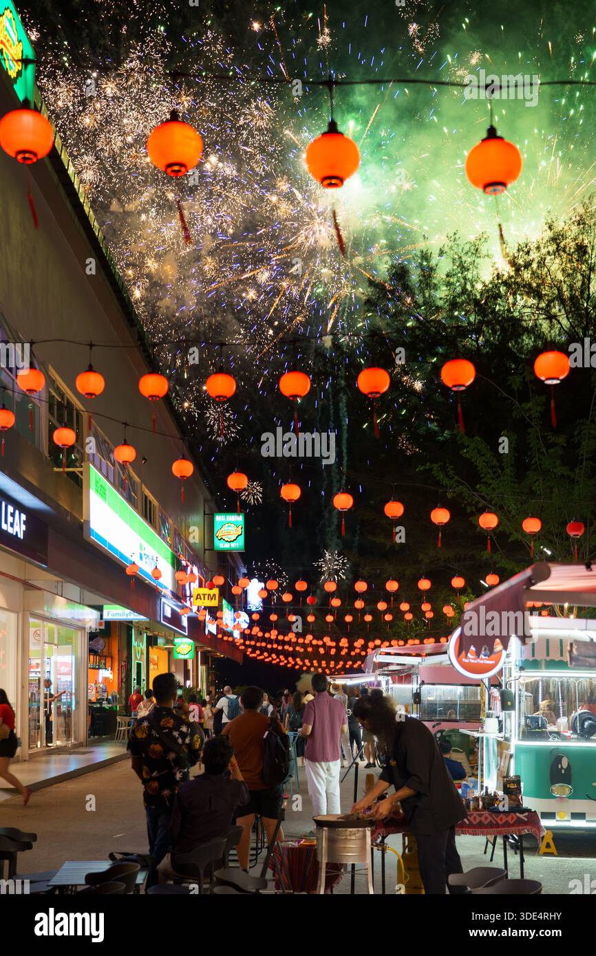 Night Street Market in Batu Ferringhi With Fireworks Overhead, Penang ...