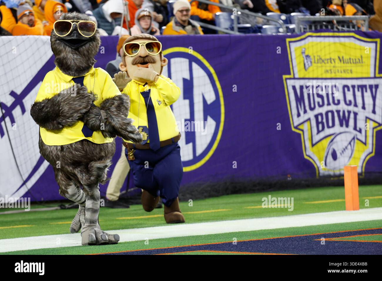 NASHVILLE, TN - DECEMBER 30: Liberty Mutual mascots LiMu Emu and Doug ...