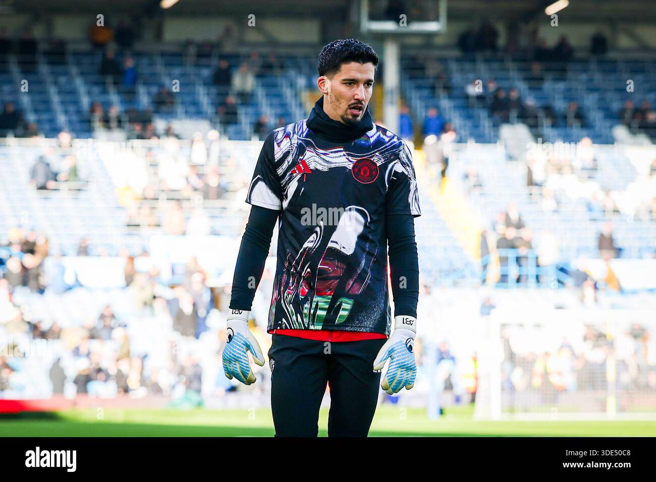 Manchester United goalkeeper Altay Bayındır (1) warm up during the ...