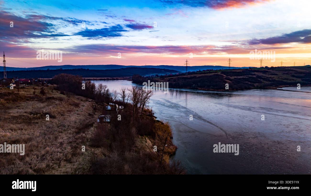 Aerial view of Dumbrava Lake in Iasi County, Romania, at sunset in ...