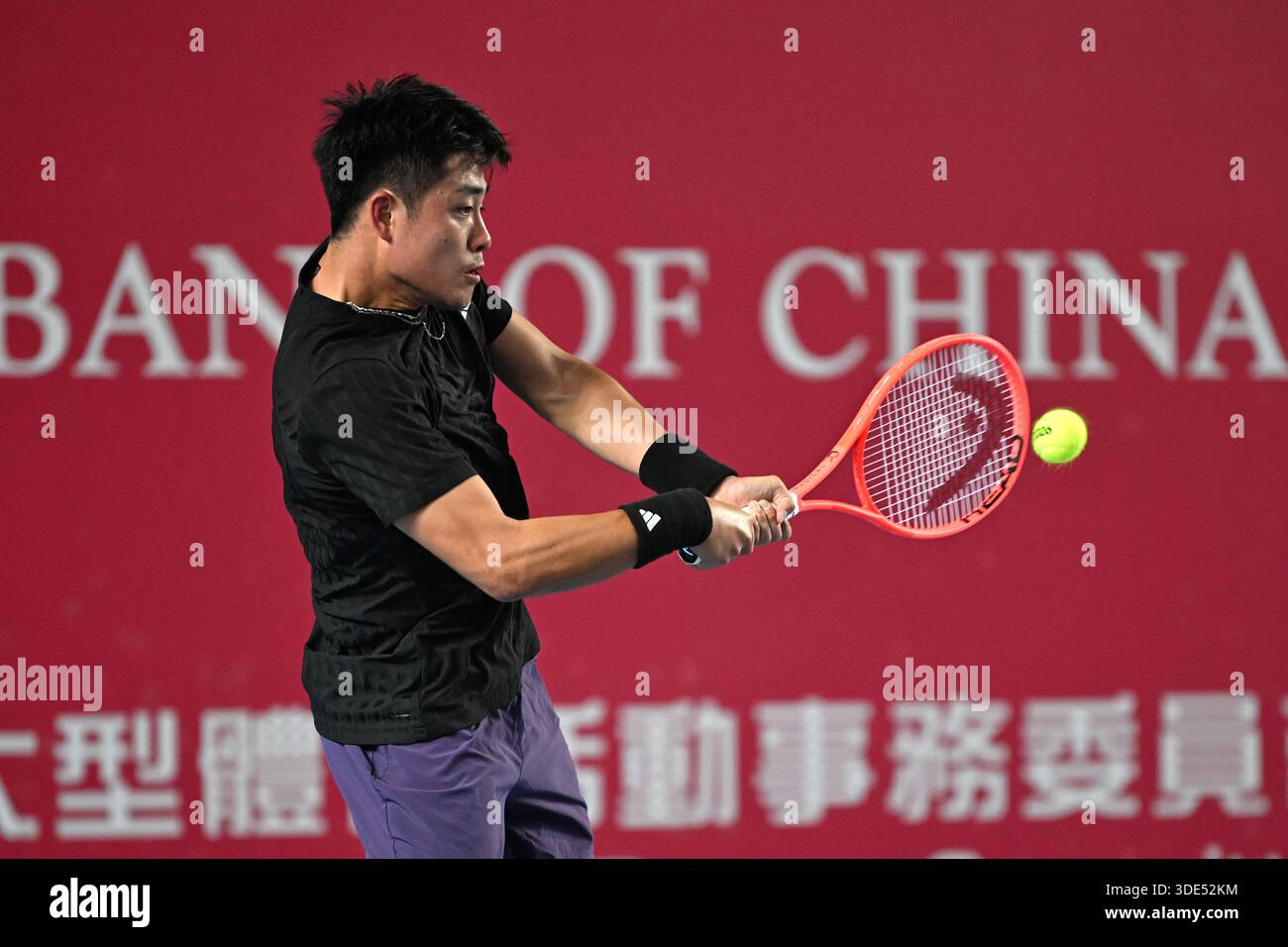 Yibing Wu, a Chinese tennis player, during a match at the Hong Kong ...