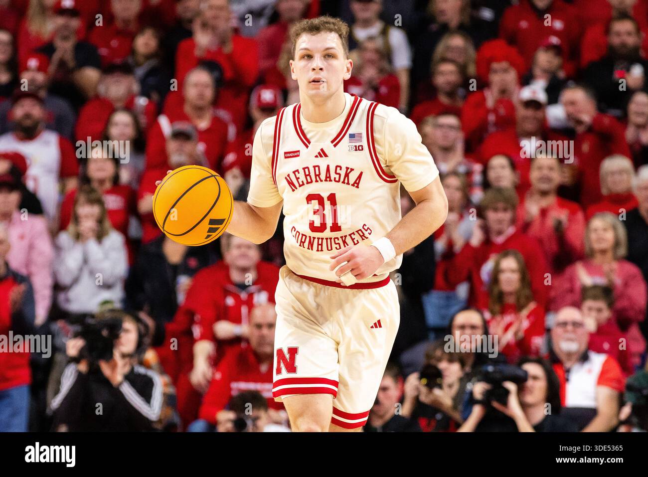 Nebraska guard Cale Jacobsen (31) brings the ball upcourt against ...