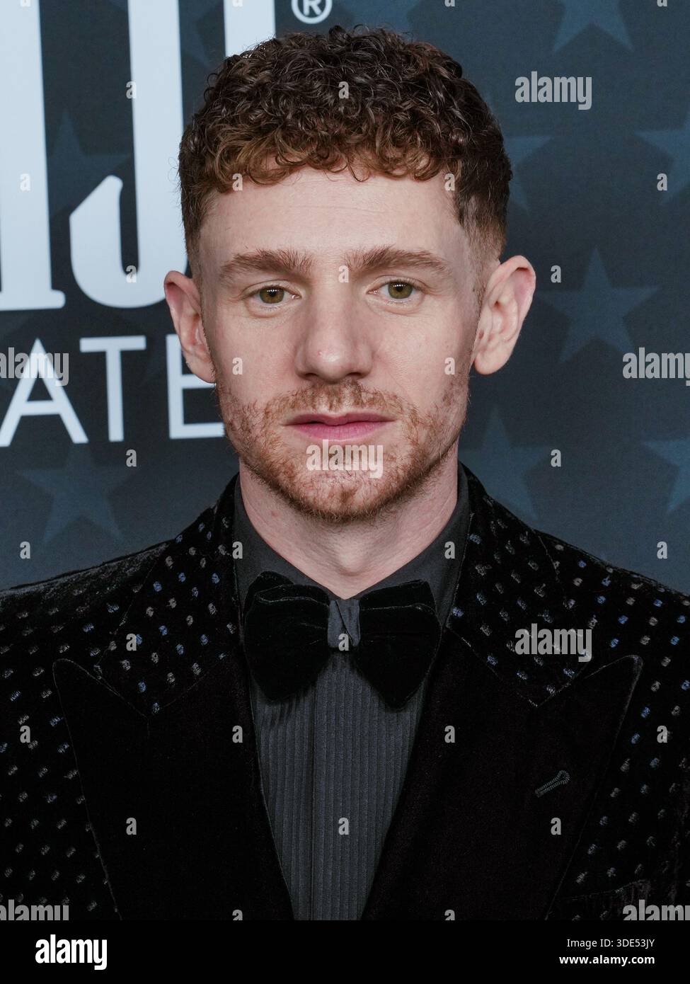 Chris Perfetti walking on the red carpet at the 31st Annual Critics ...