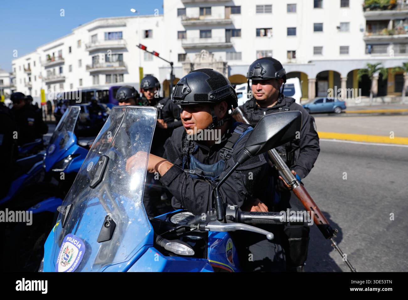 Police patrol in downtown Caracas, Venezuela, Monday, Jan. 5, 2026. (AP ...