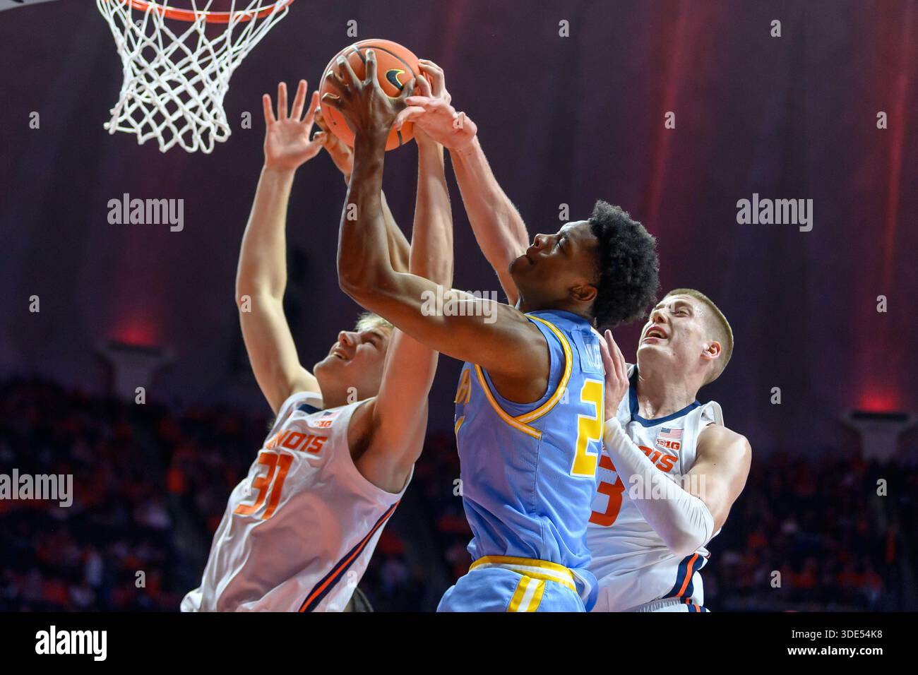 Southern University's Ashton Magee battles for a rebound with Illinois ...