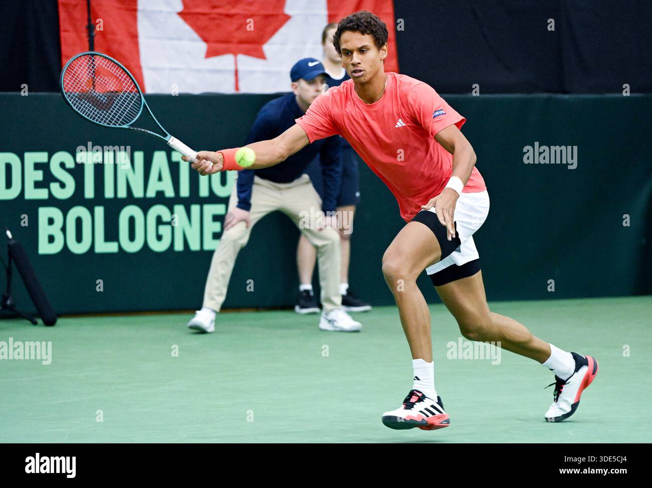 Canada's Gabriel Diallo plays a shot to Hungary's Fabian Marozsan ...
