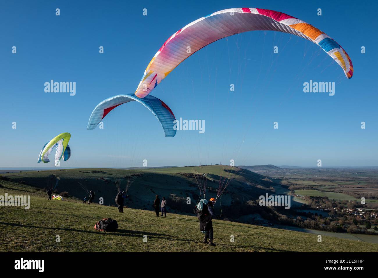Brighton, January 4th 2026: Paraglider pilots getting ready to take off ...