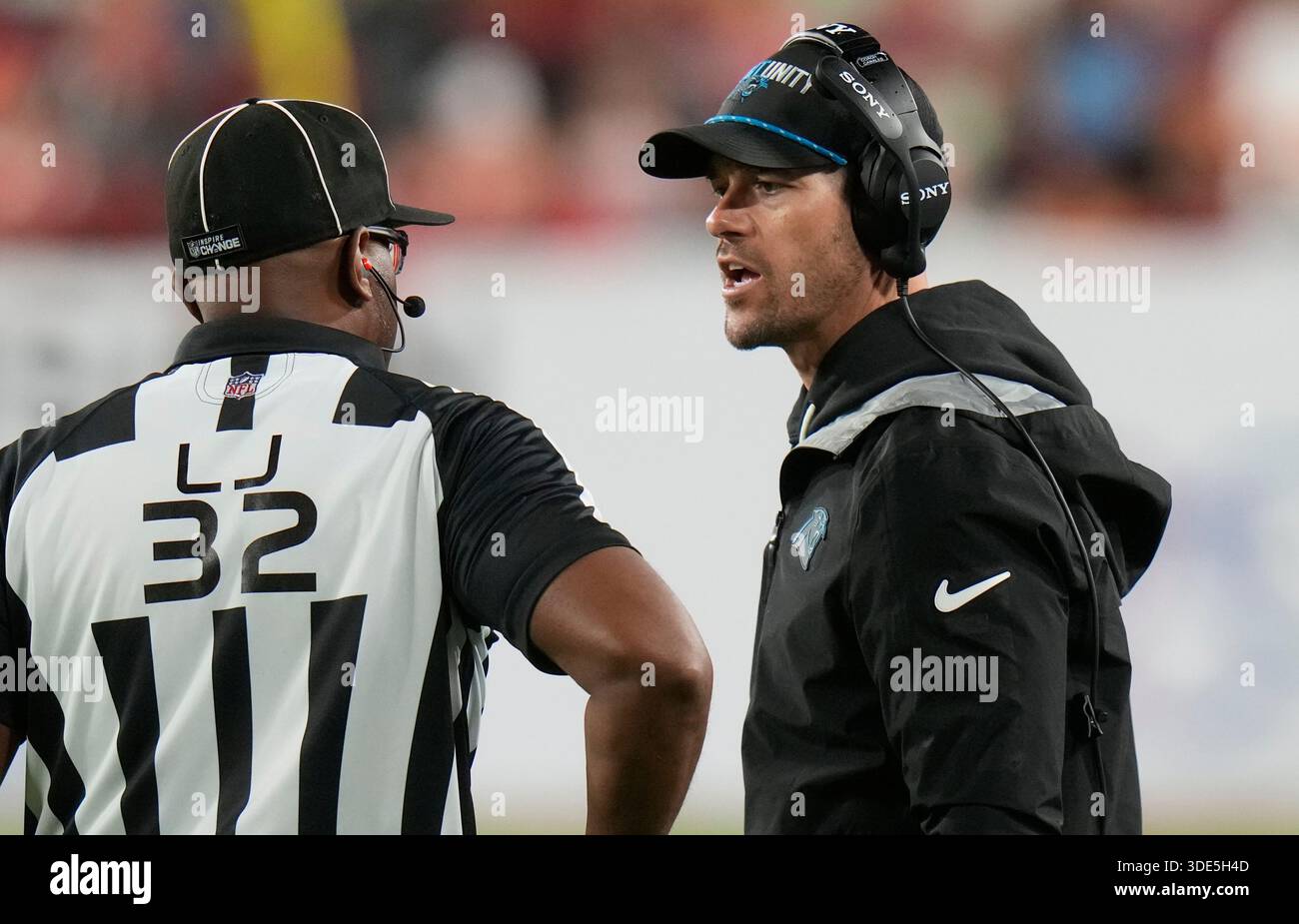 Carolina Panthers head coach Dave Canales talks to line judge Walter ...