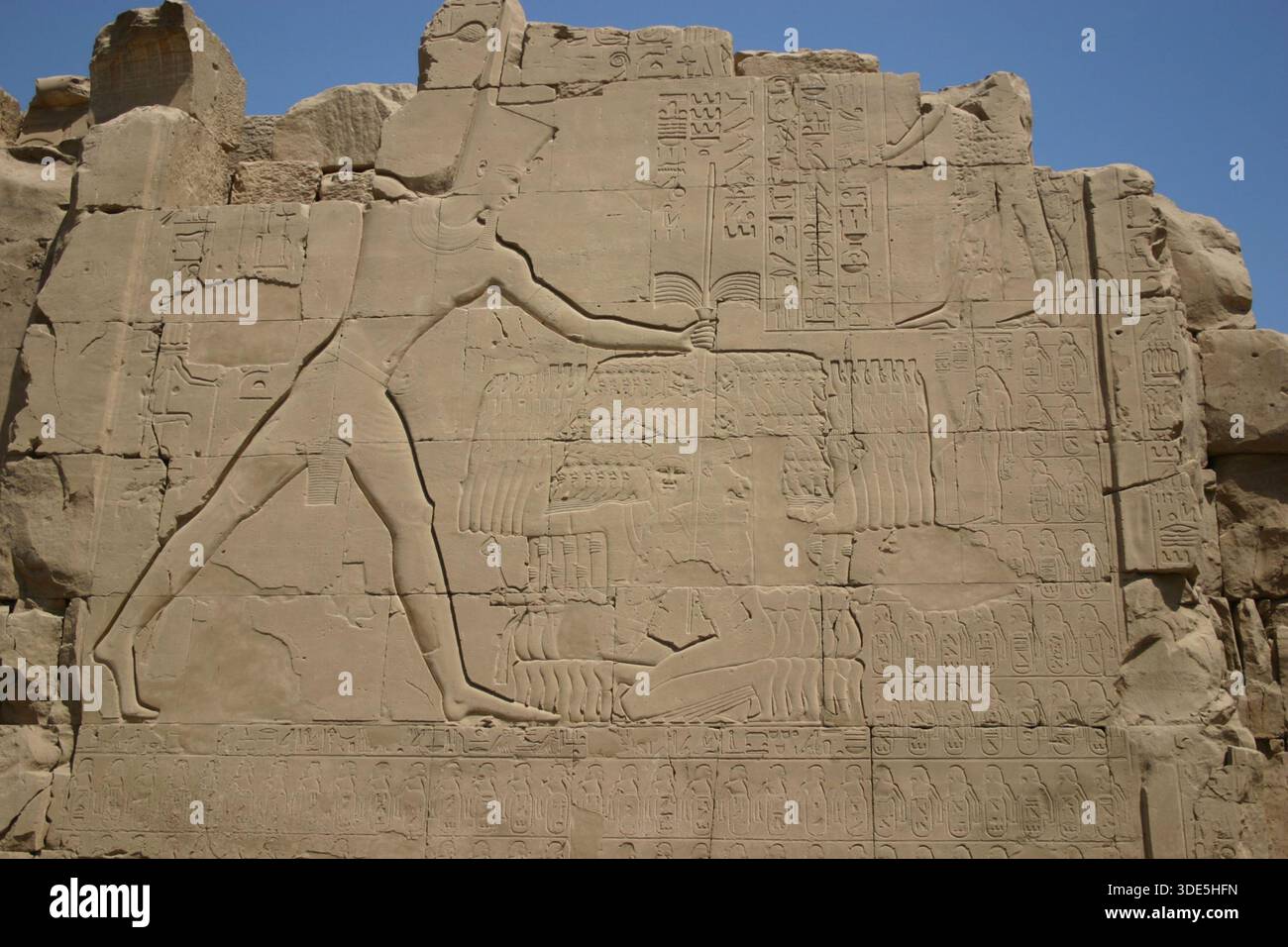 Thutmose III smiting Canaanite enemies on the seventh pylon at Karnak ...