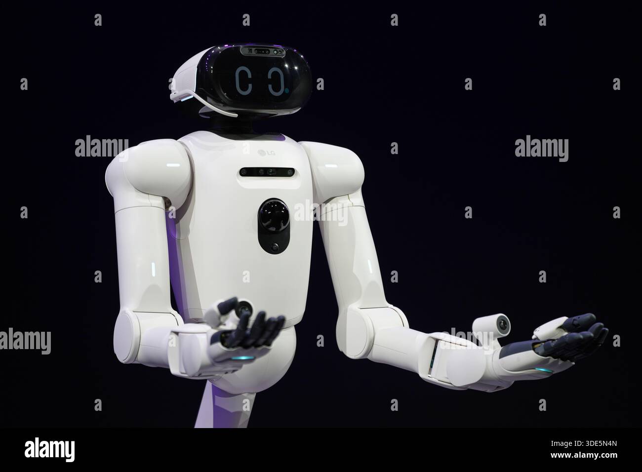 CLOiD, an LG Electronics home robot, interacts with the audience during ...
