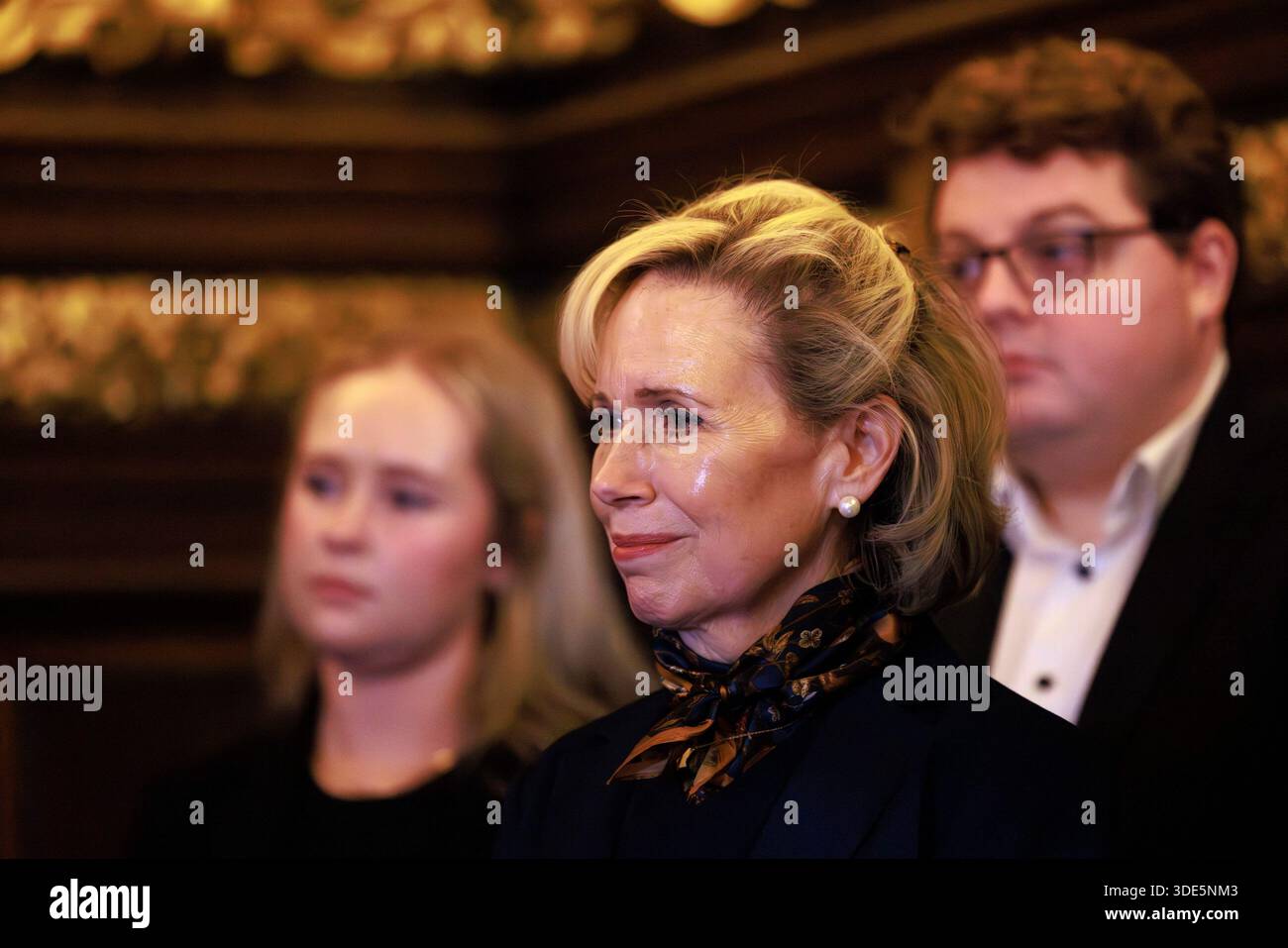 Gwen Walz, center, the wife of Minnesota Gov. Tim Walz, becomes ...