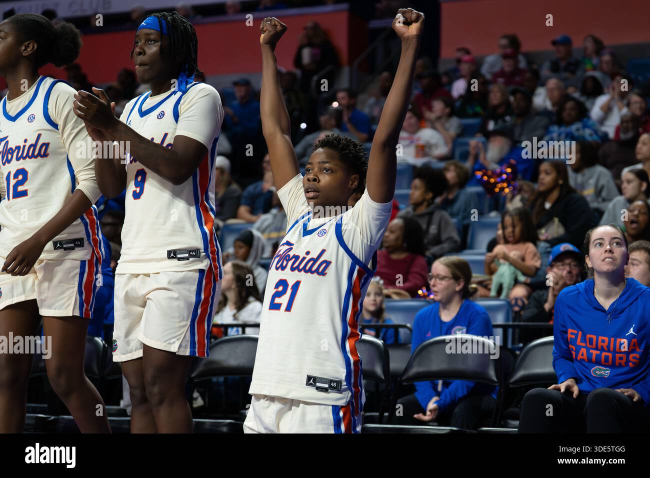 Florida center Gift Ezekiel (21) celebrates a layup against South ...