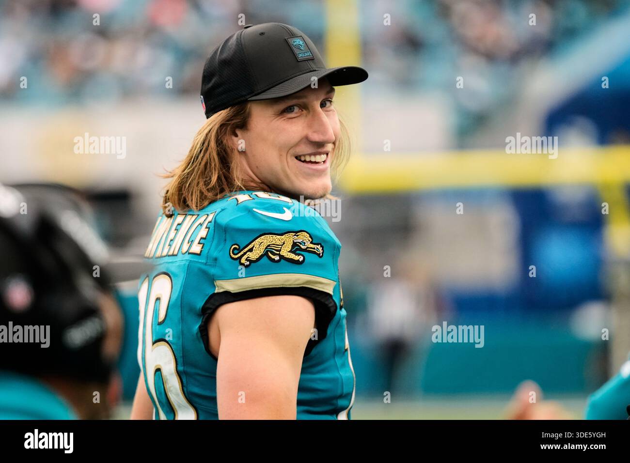 Jacksonville Jaguars quarterback Trevor Lawrence smiles with teammates ...