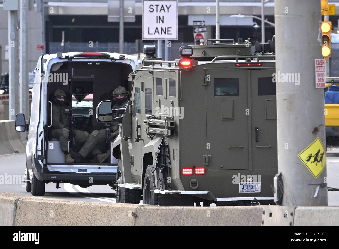 An armored vehicle in a motorcade transports ousted Venezuelan ...