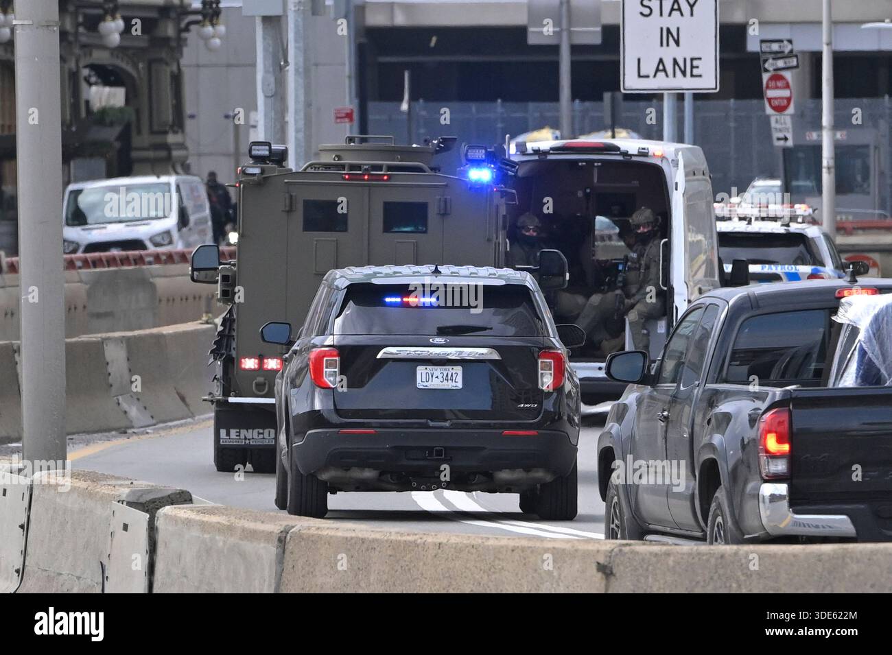 An armored vehicle in a motorcade transports ousted Venezuelan ...