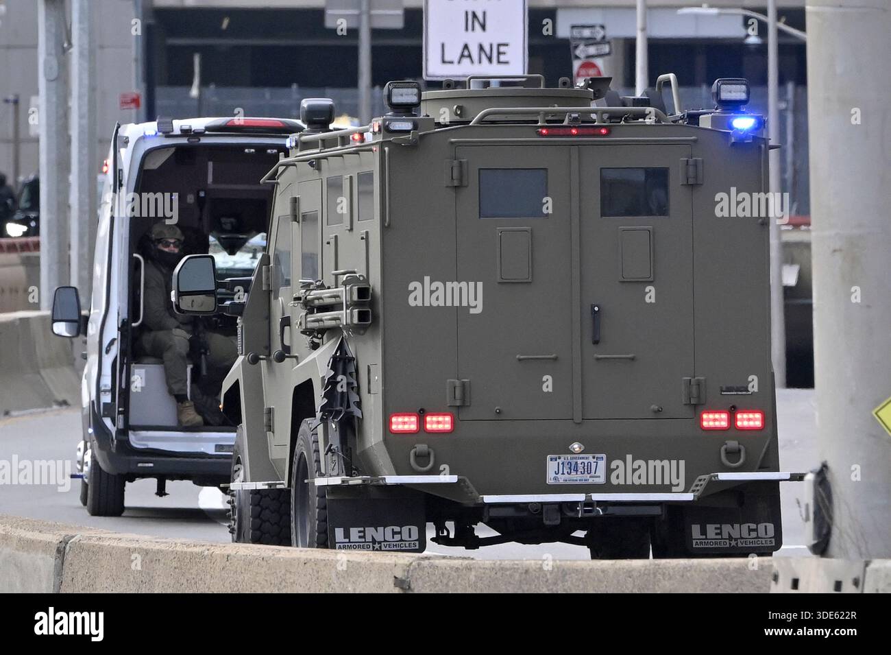 An armored vehicle in a motorcade transports ousted Venezuelan ...