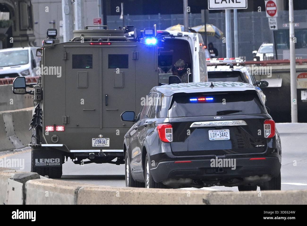 An armored vehicle in a motorcade transports ousted Venezuelan ...