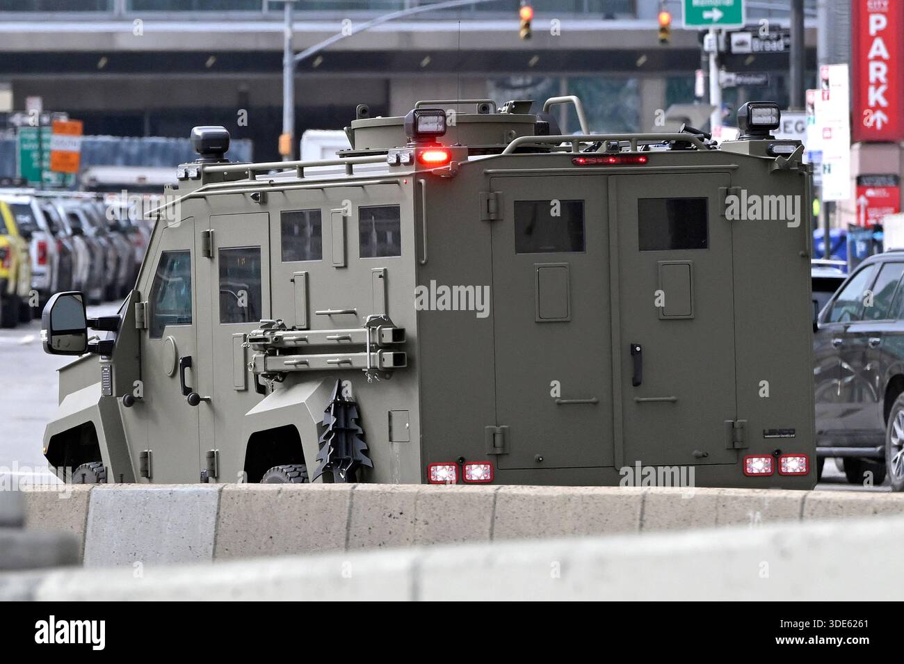 An armored vehicle in a motorcade transports ousted Venezuelan ...