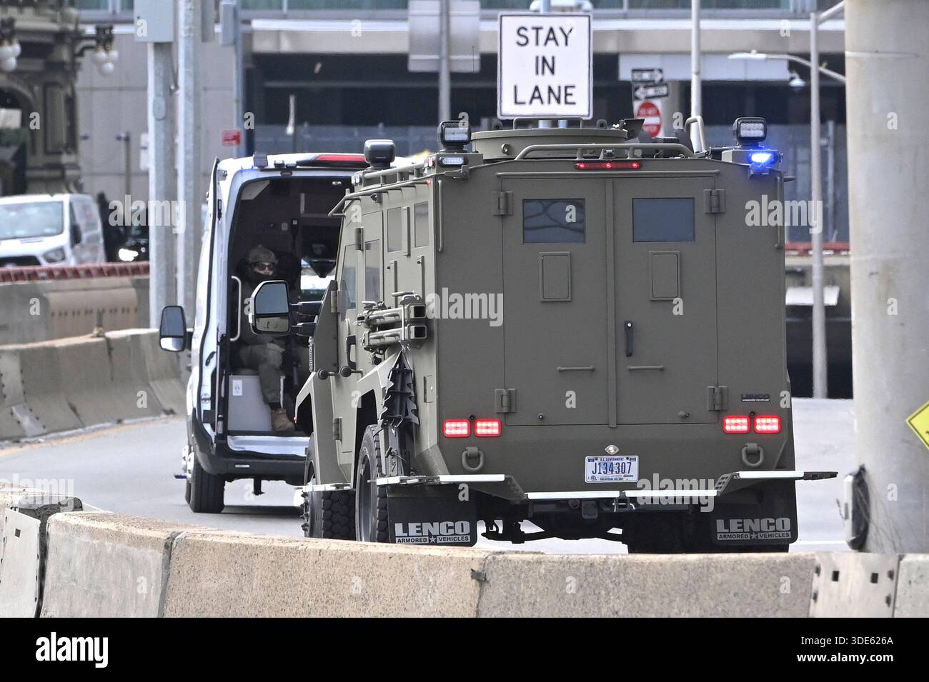 An armored vehicle in a motorcade transports ousted Venezuelan ...