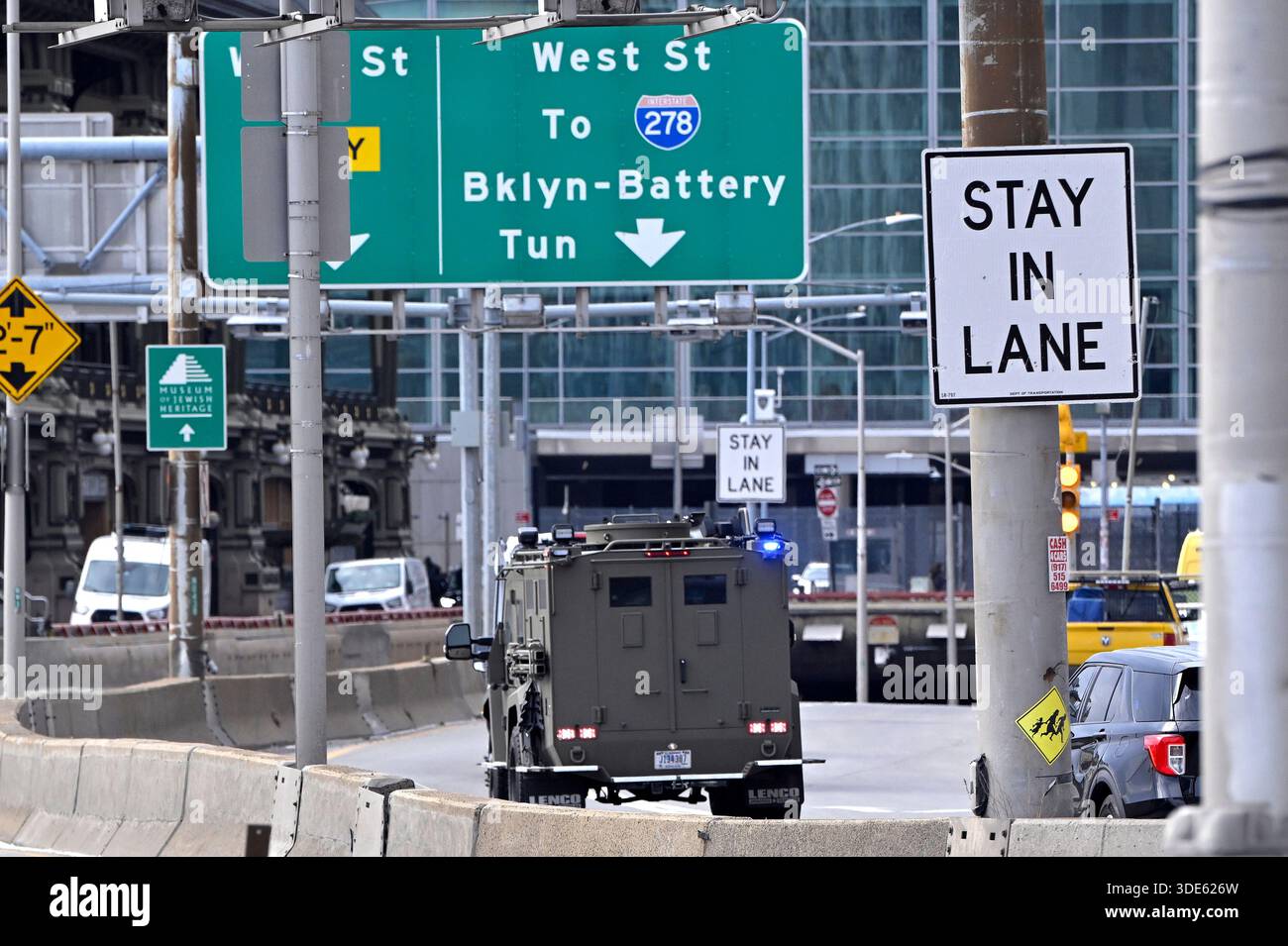 An armored vehicle in a motorcade transports ousted Venezuelan ...