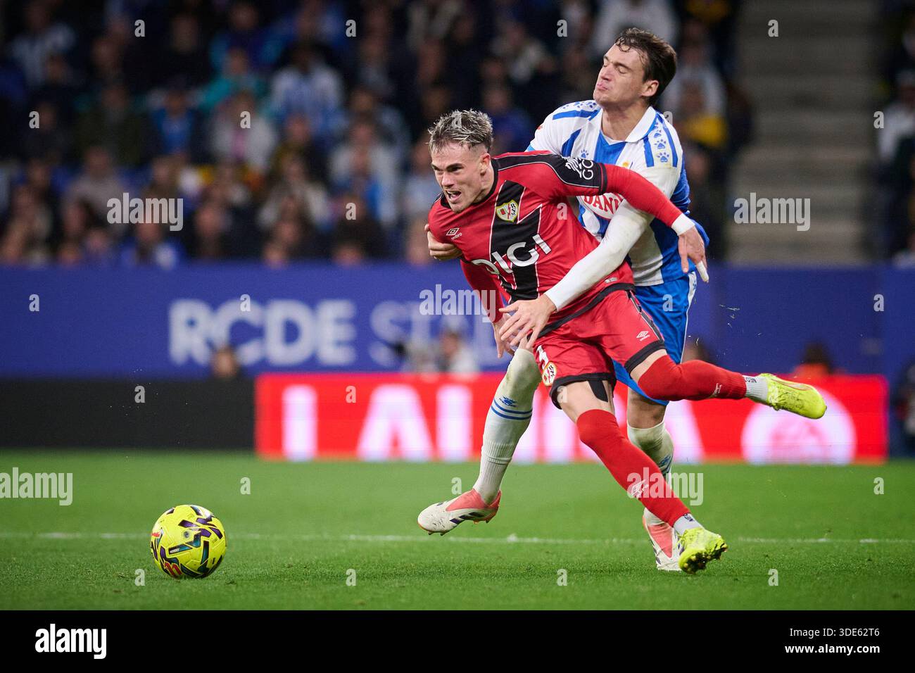 RCD Espanyol's Urko Gonzalez (R) and Rayo Vallecano's Pep Chavarria ...