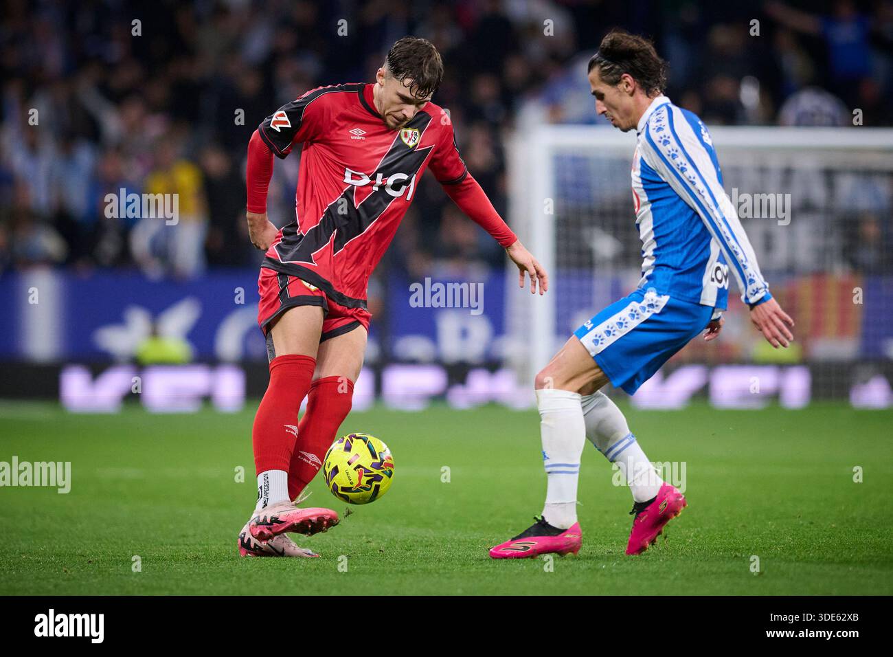 RCD Espanyol's Pere Milla (R) and Rayo Vallecano's Andrei Ratiu during ...