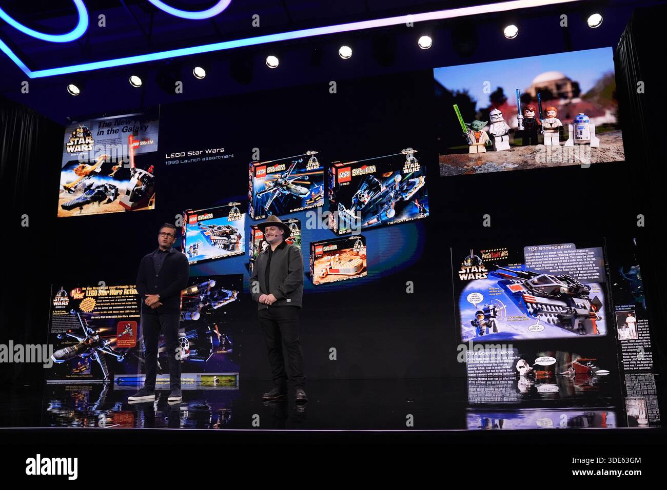Asad Ayaz, left, and Dave Filioni stand on stage during an LEGO news ...