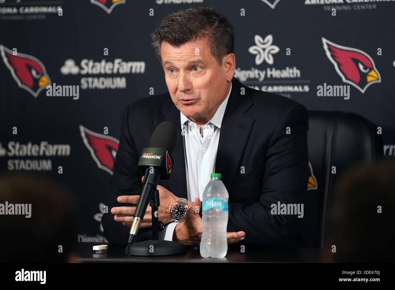 Arizona Cardinals owner Michael Bidwell acknowledges the media after ...