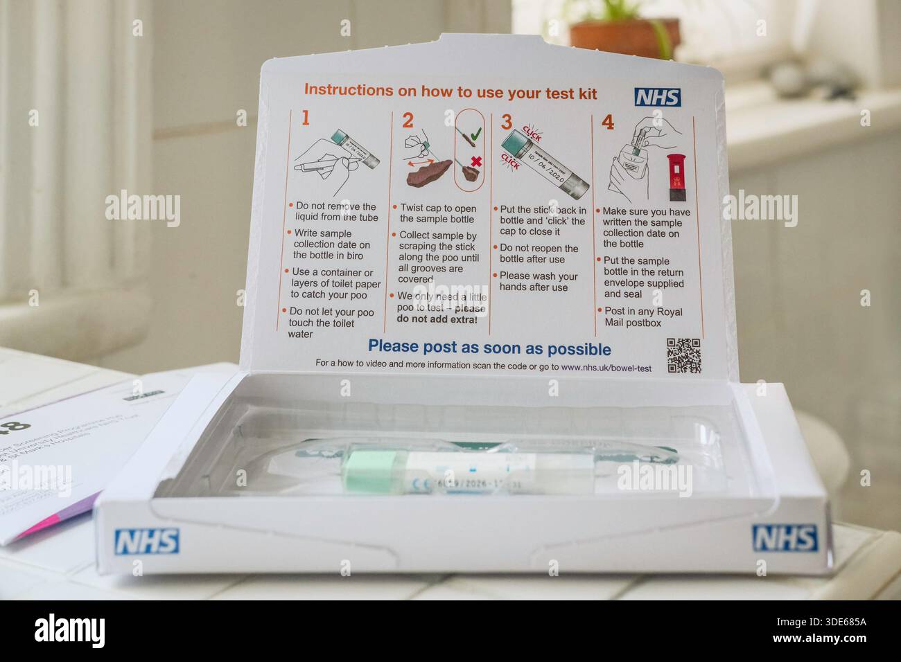 NHS home use bowel cancer screening test kit Stock Photo - Alamy