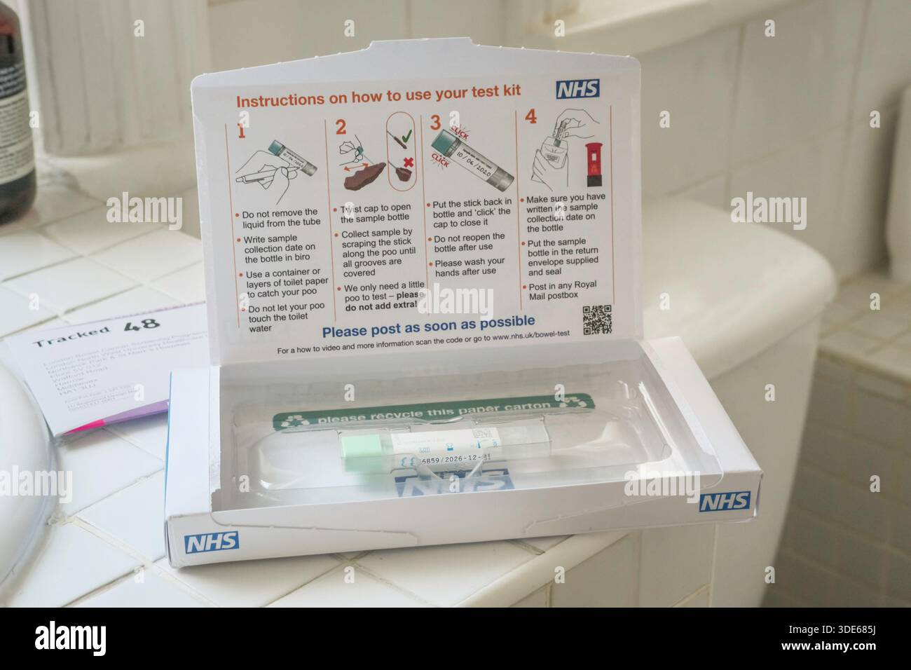 NHS home use bowel cancer screening test kit Stock Photo - Alamy