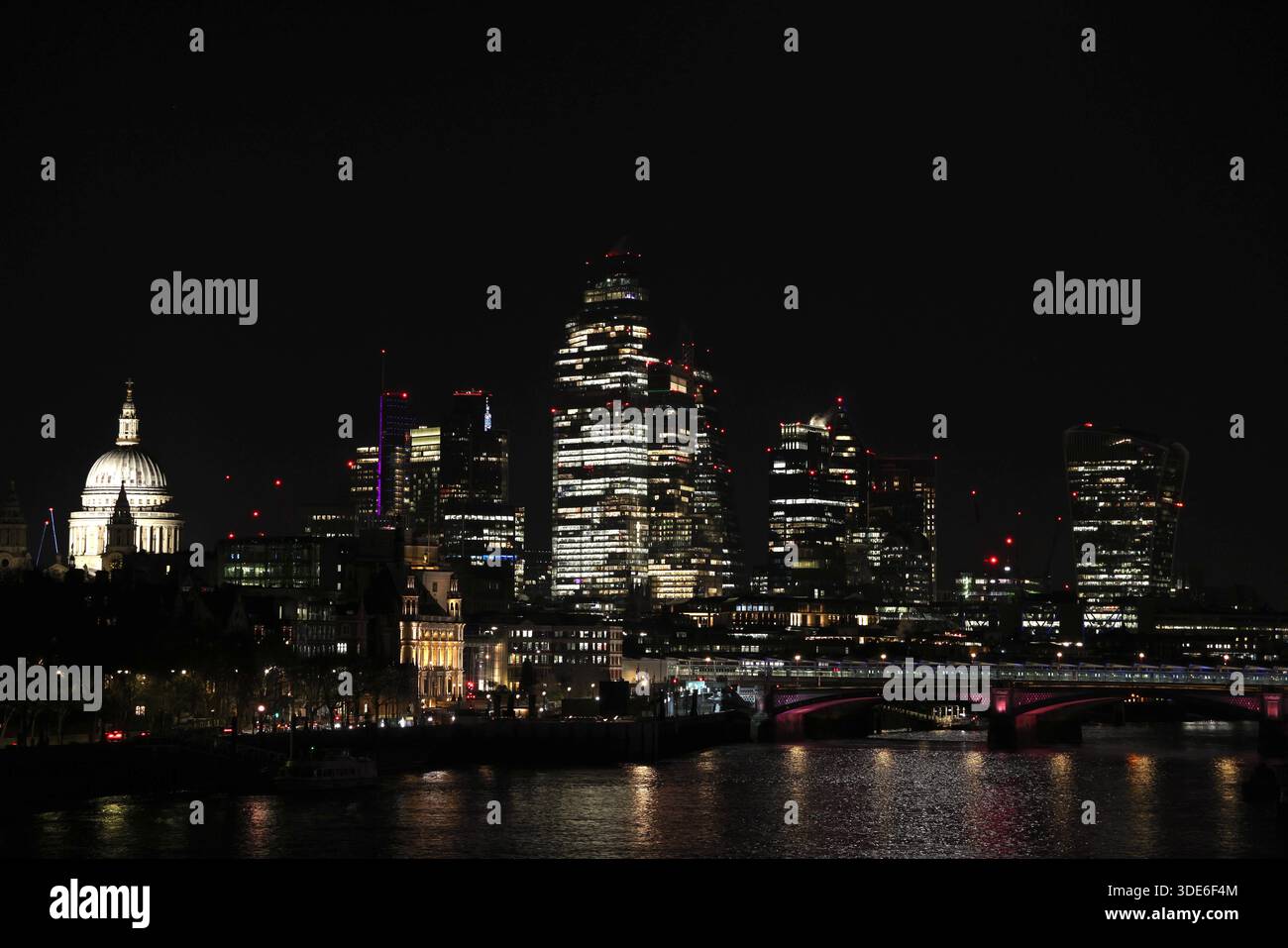 5th January 2026 city of London at night with St Paul’s Cathedral (left ...