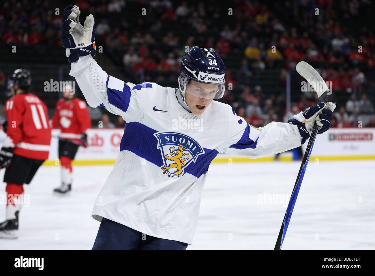 Finland defenseman Arttu Valila (34) celebrates after scoring against ...