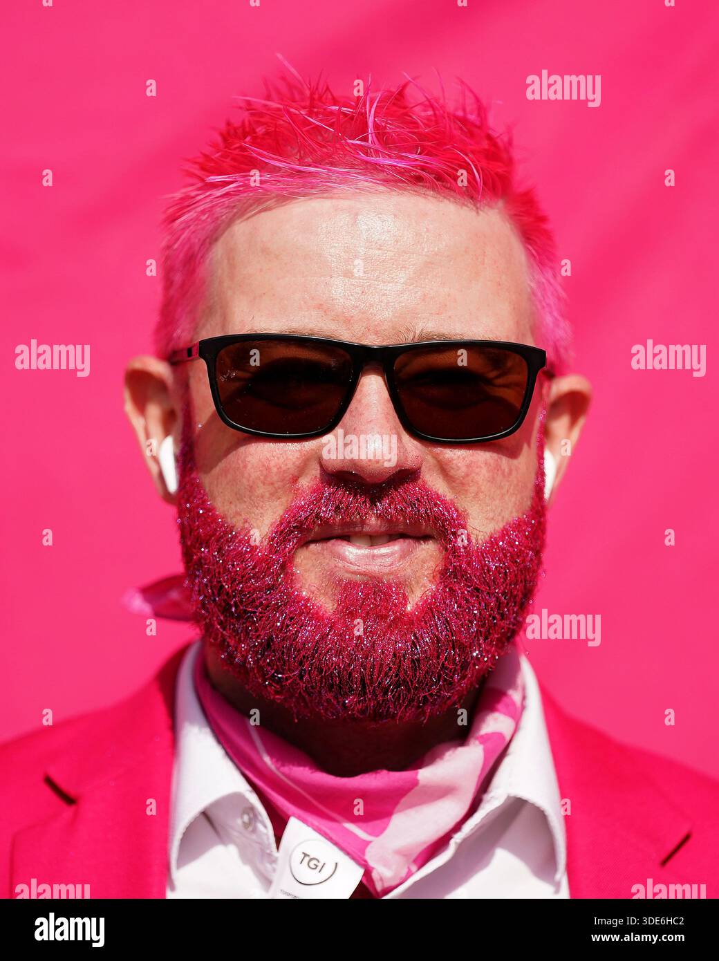 A fan dressed in all pink for Jane McGrath Pink Day arrives at the ...