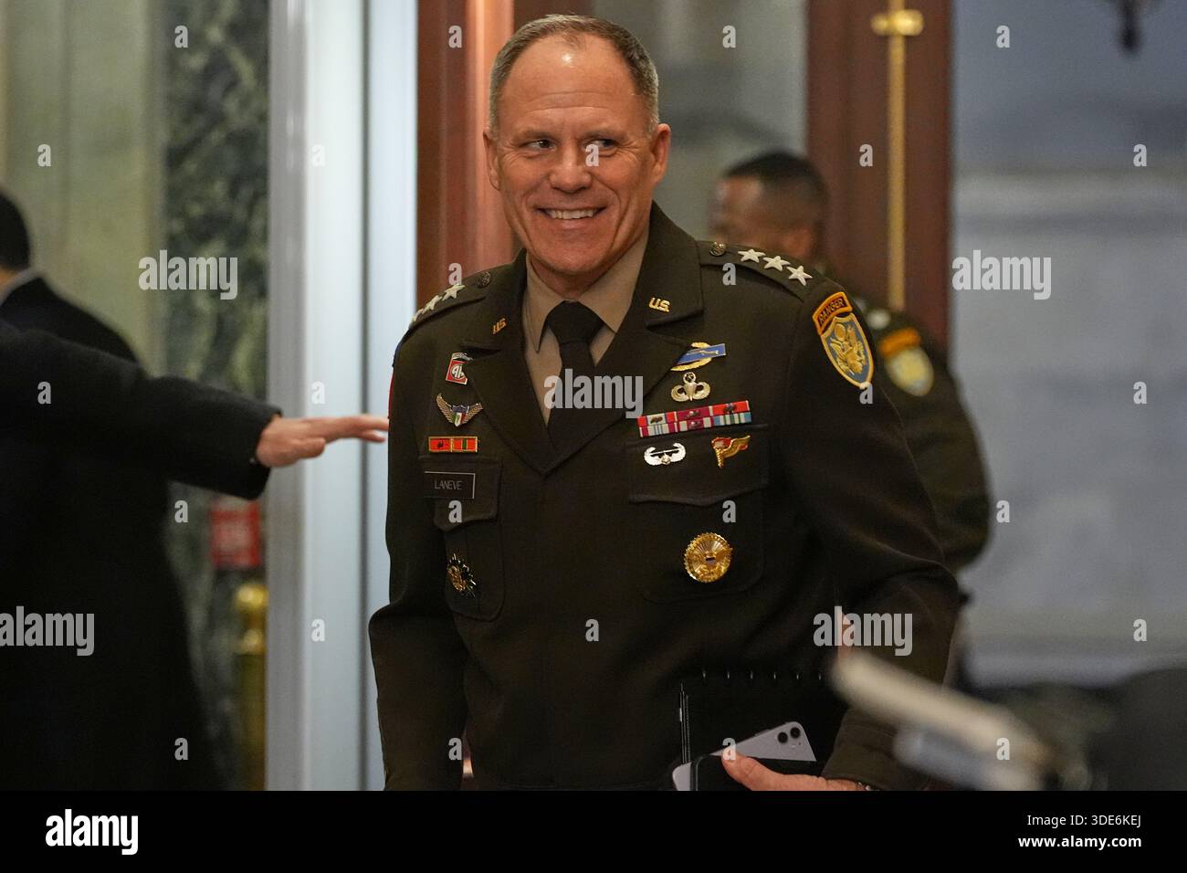 Army Lt. Gen. Christopher LaNeve, arrives with Defense Secretary Pete ...