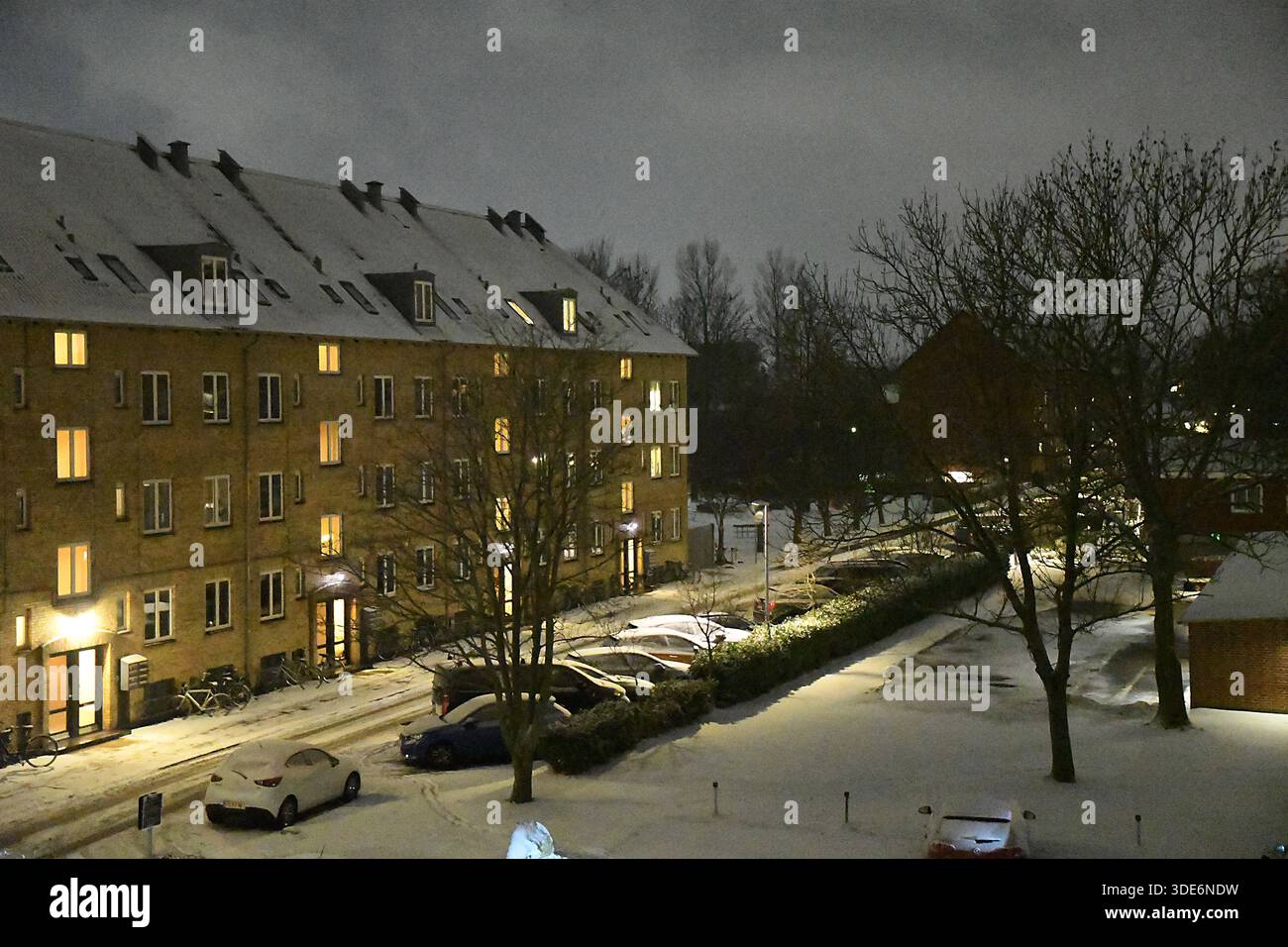 Copenhagen/Denmark/ 25 .january 2026/ snow fall vehichles covered with ...